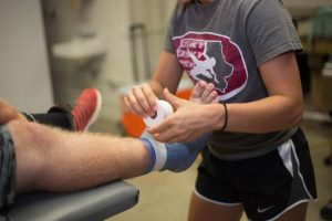 Rugby Taping Techniques: What Are They & How | Gulf Physio